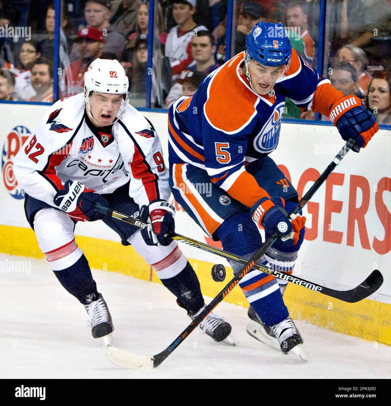 Washington Capitals' Evgeny Kuznetsov (92) chases Edmonton Oilers' Mark ...