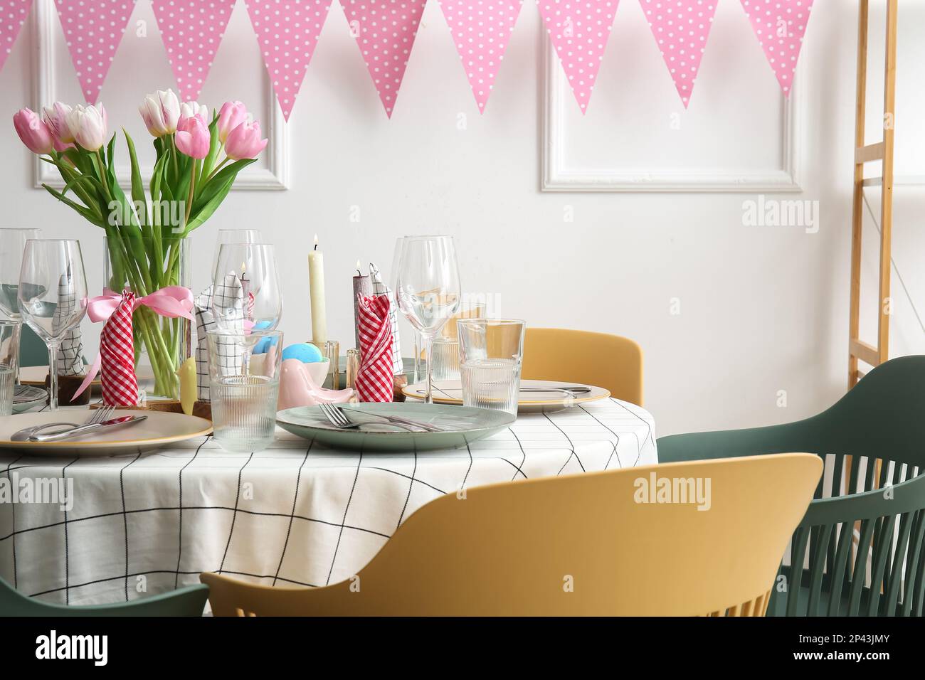 Table with beautiful serving for Easter celebration in dining room ...