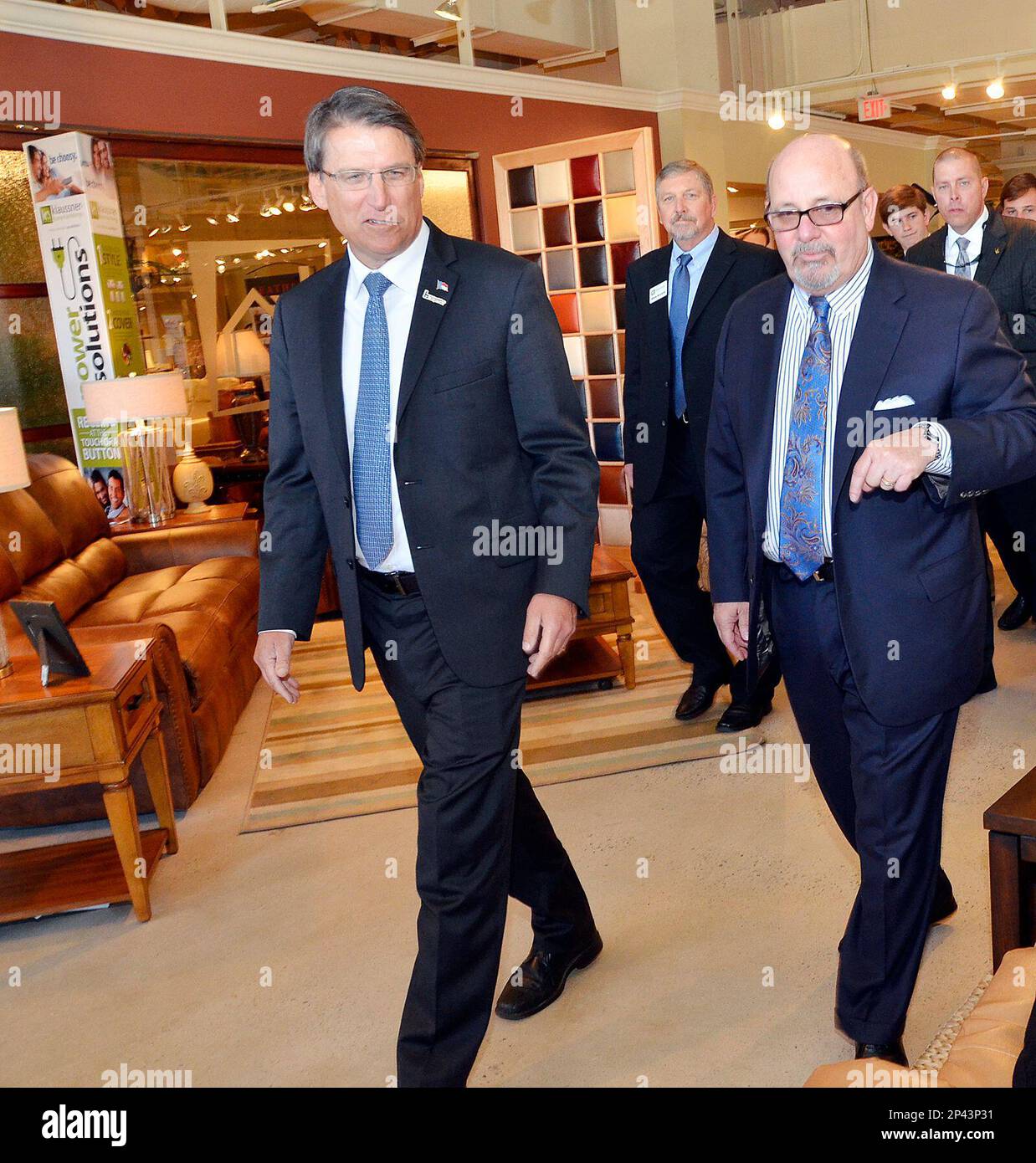 North Carolina Gov. Pat McCrory, left, with Klaussner Home Furnishings ...