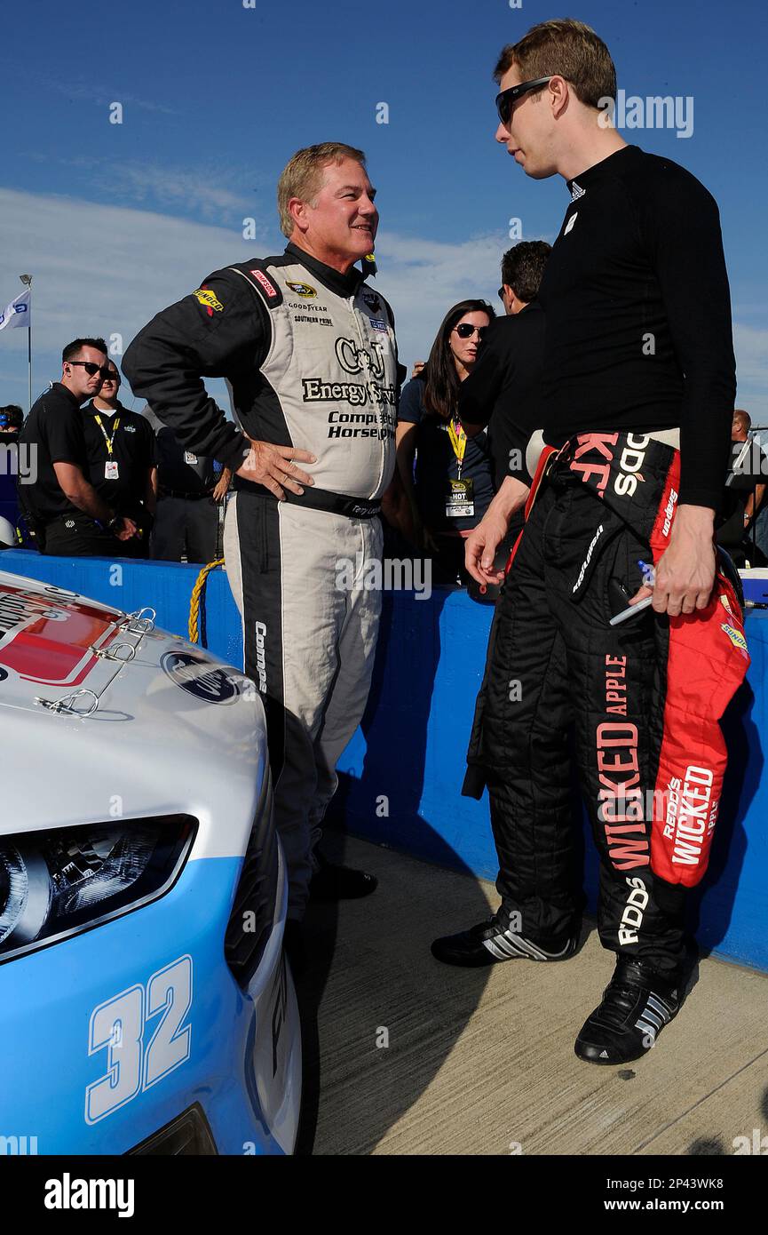 OCTOBER 18: Terry Labonte (32) talks with Brad Keselowski (2) during ...