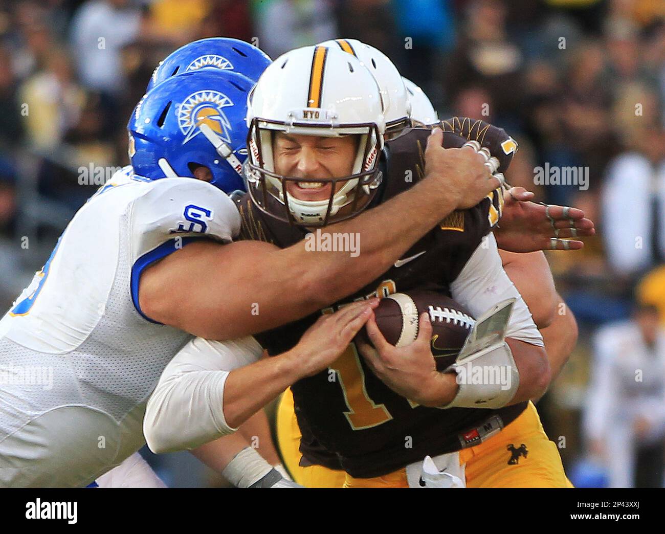 University of Wyoming quarterback Colby Kirkegaard fights for ...