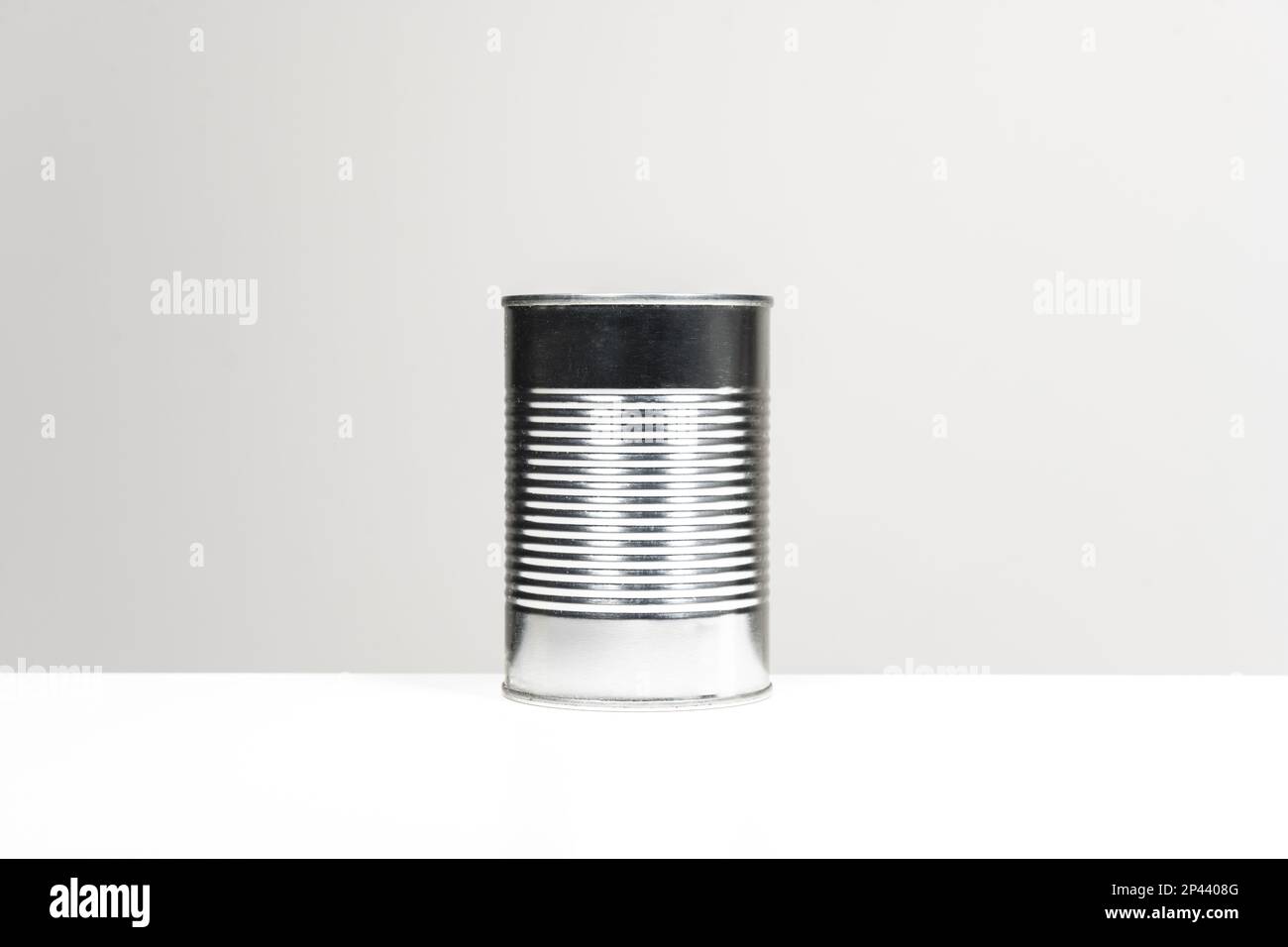 A can of canned fast food with a white background on a smooth white ...