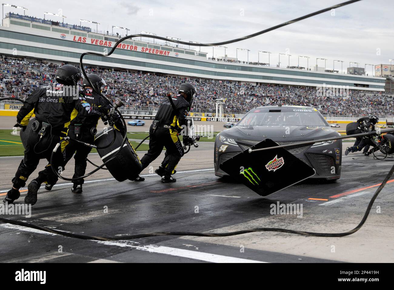 Ty Gibbs (54) pulls in for a pit stop before the final laps of a NASCAR ...