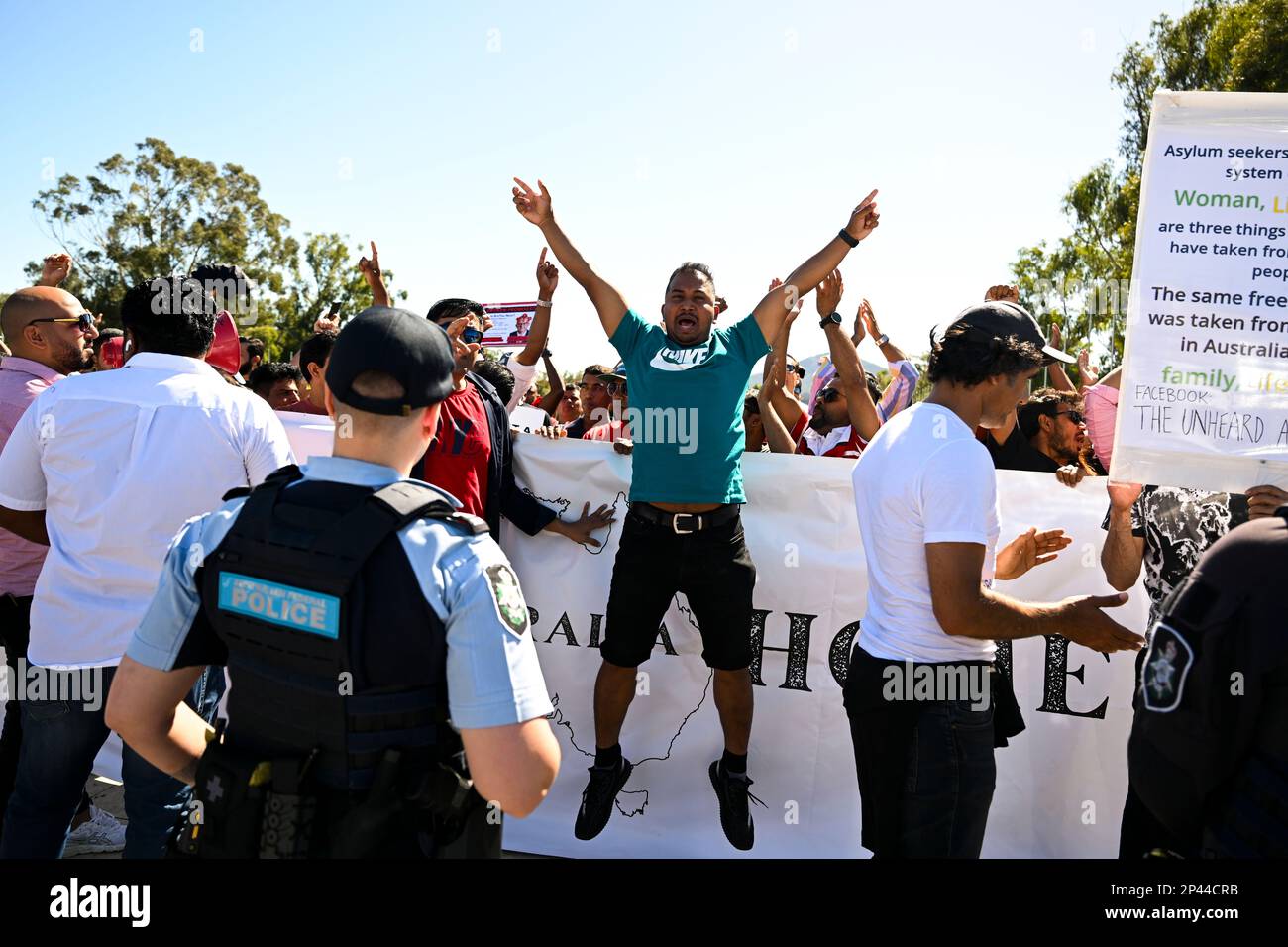 Protesters attend a rally demanding permanent visas for refugee outside ...