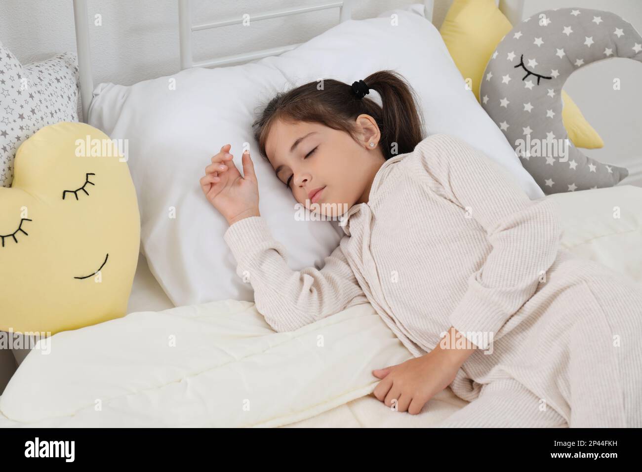 Cute girl in pajamas sleeping at home Stock Photo - Alamy