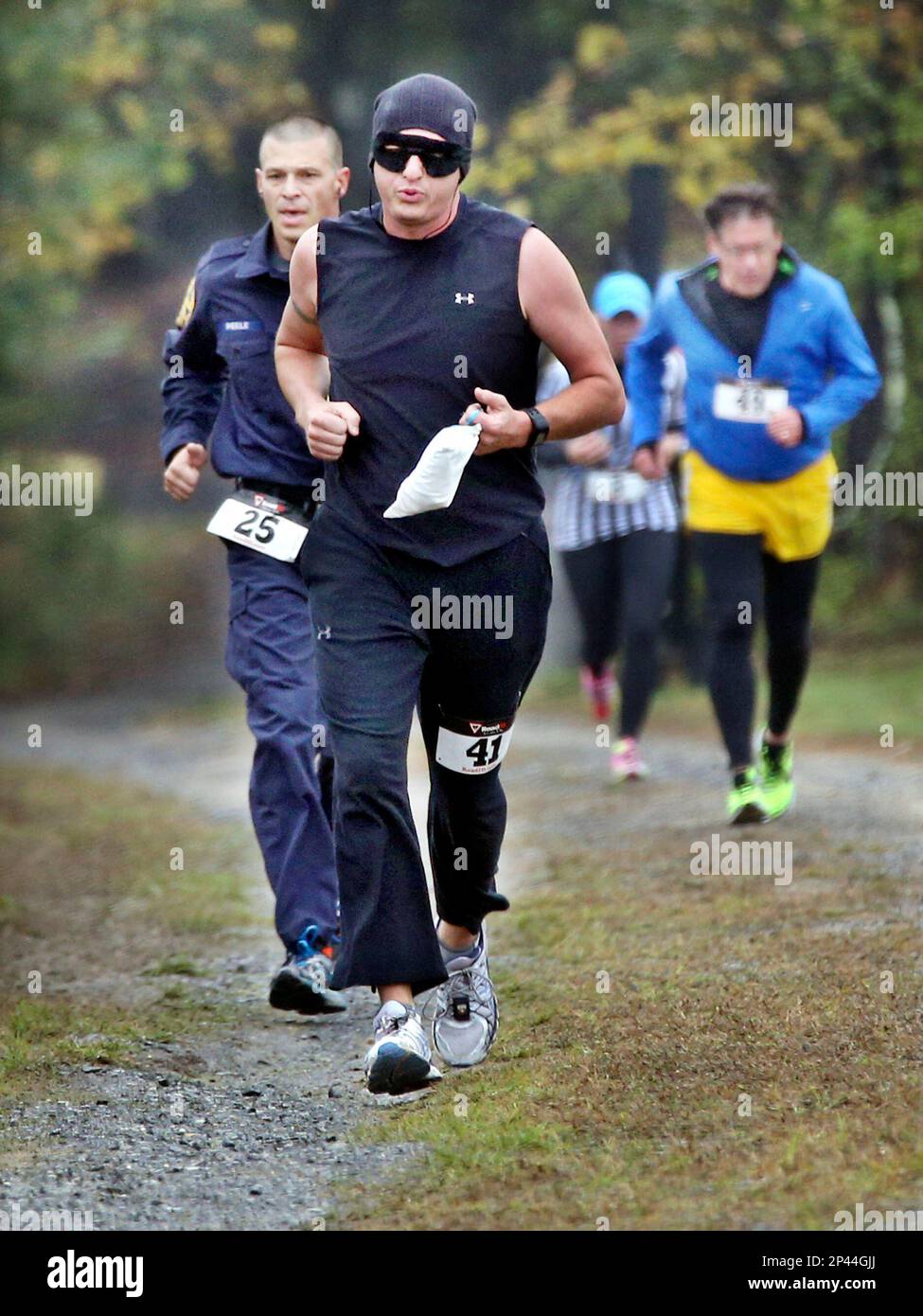 Leif Sundberg, front, is pursued by Virginia State Trooper Greg Peele ...
