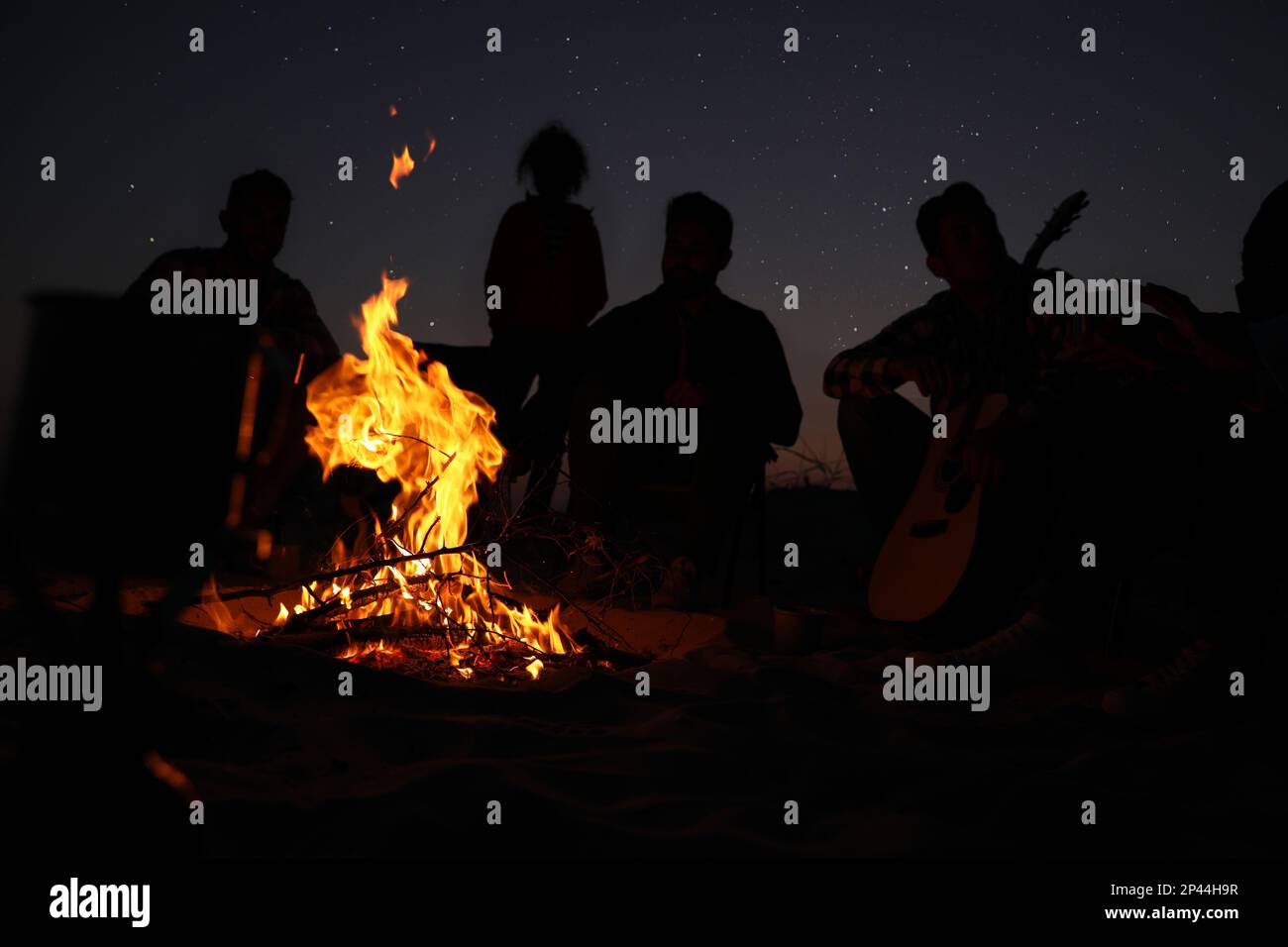 Gathering around fireplace hi-res stock photography and images - Alamy