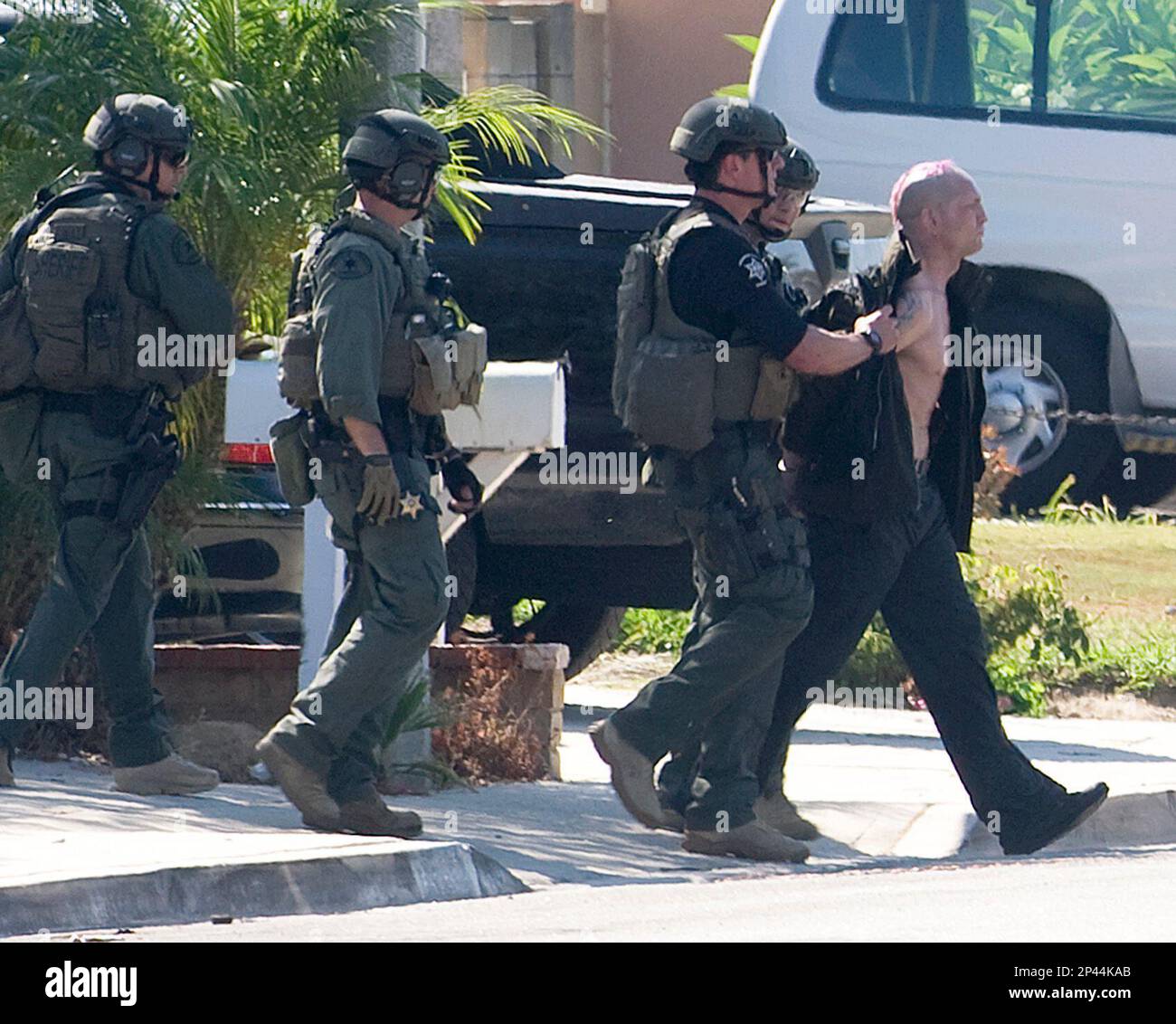 MMA fighter Jason Miller is taken into custody after surrendering to ...