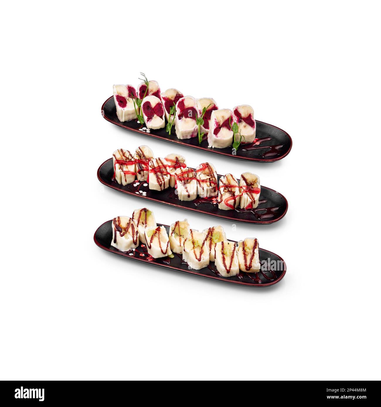 set dessert black plate white background isolation Stock Photo - Alamy