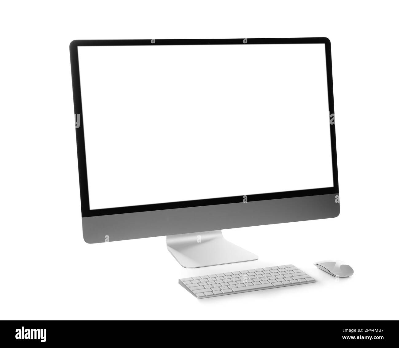 Modern computer with blank monitor screen and peripherals on white ...