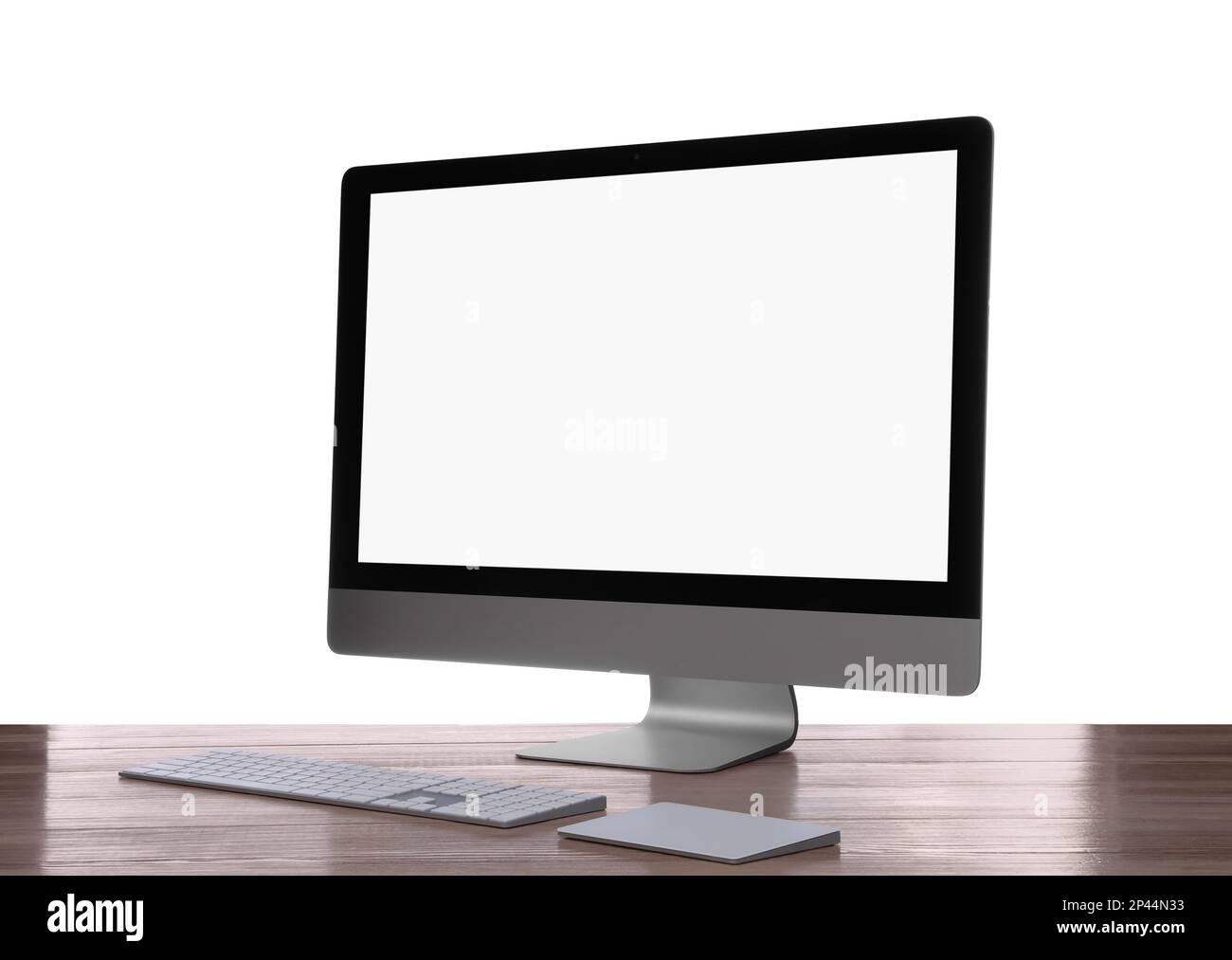 Modern computer with blank monitor screen and peripherals on wooden ...