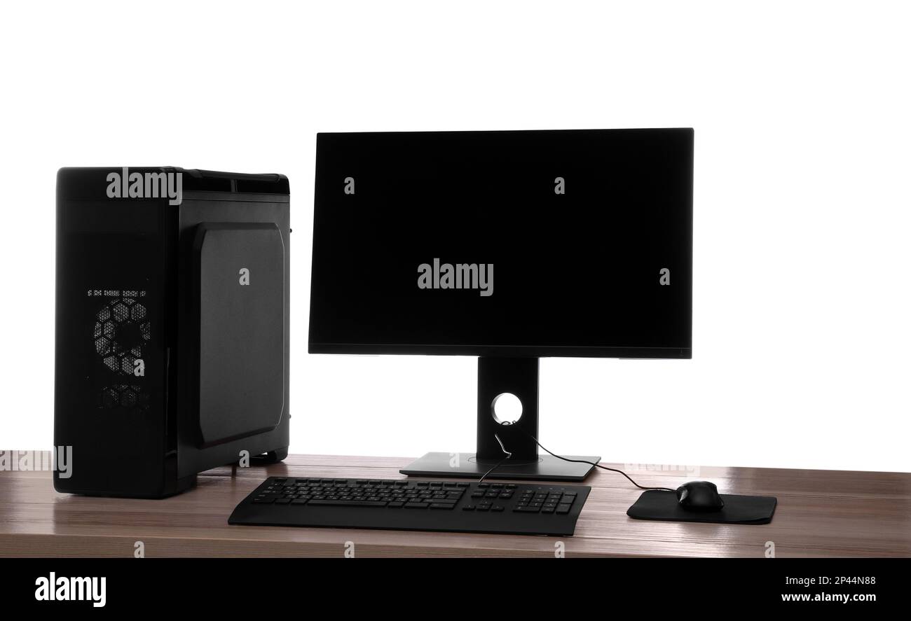 Modern computer with blank monitor screen and peripherals on wooden ...