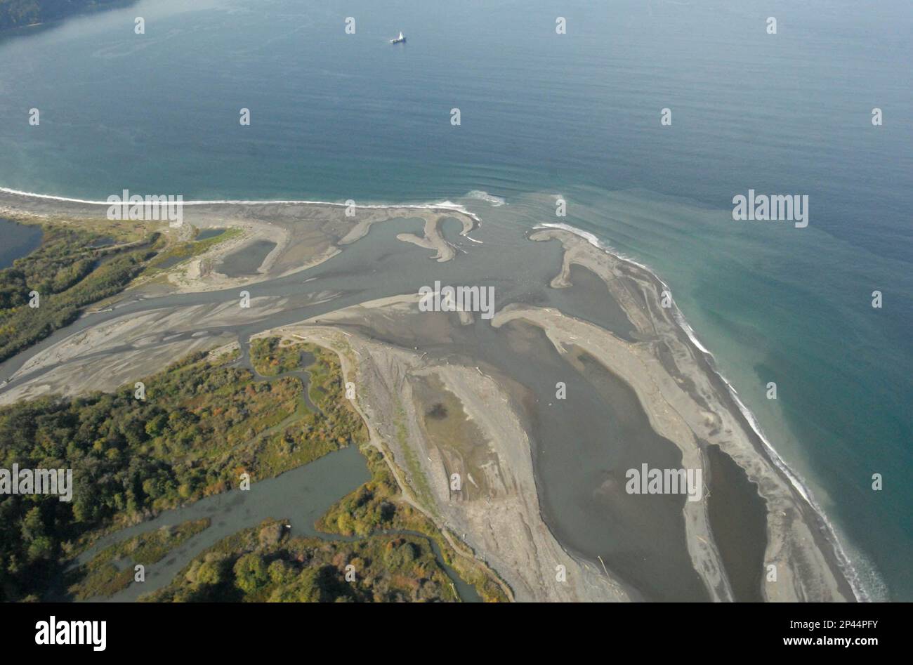 In this aerial photo taken on Oct. 2, 2014, silt-laden water empties ...