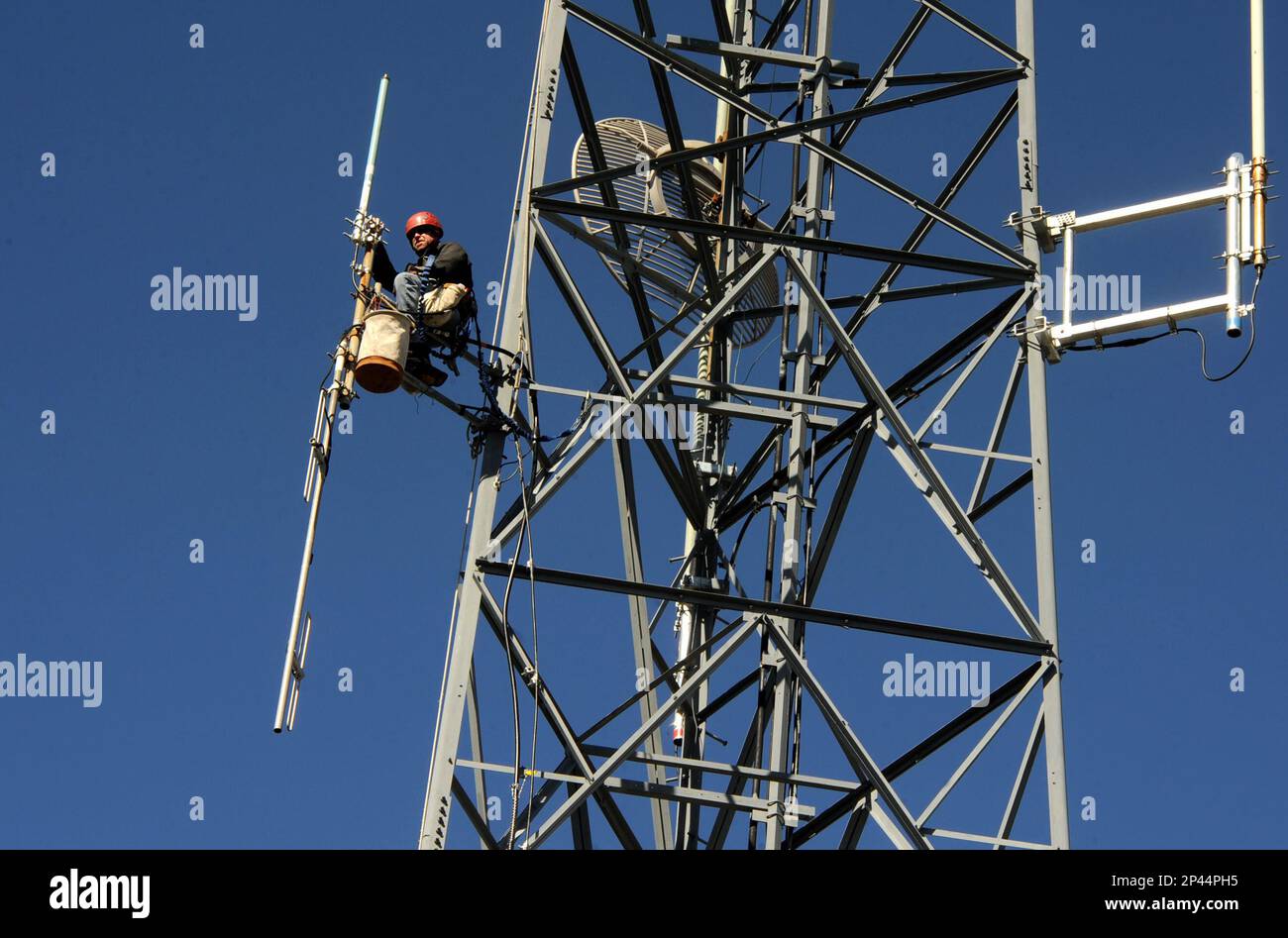 Greg Ingle, a tower climber with Noash Construction in Sebree, replaces ...