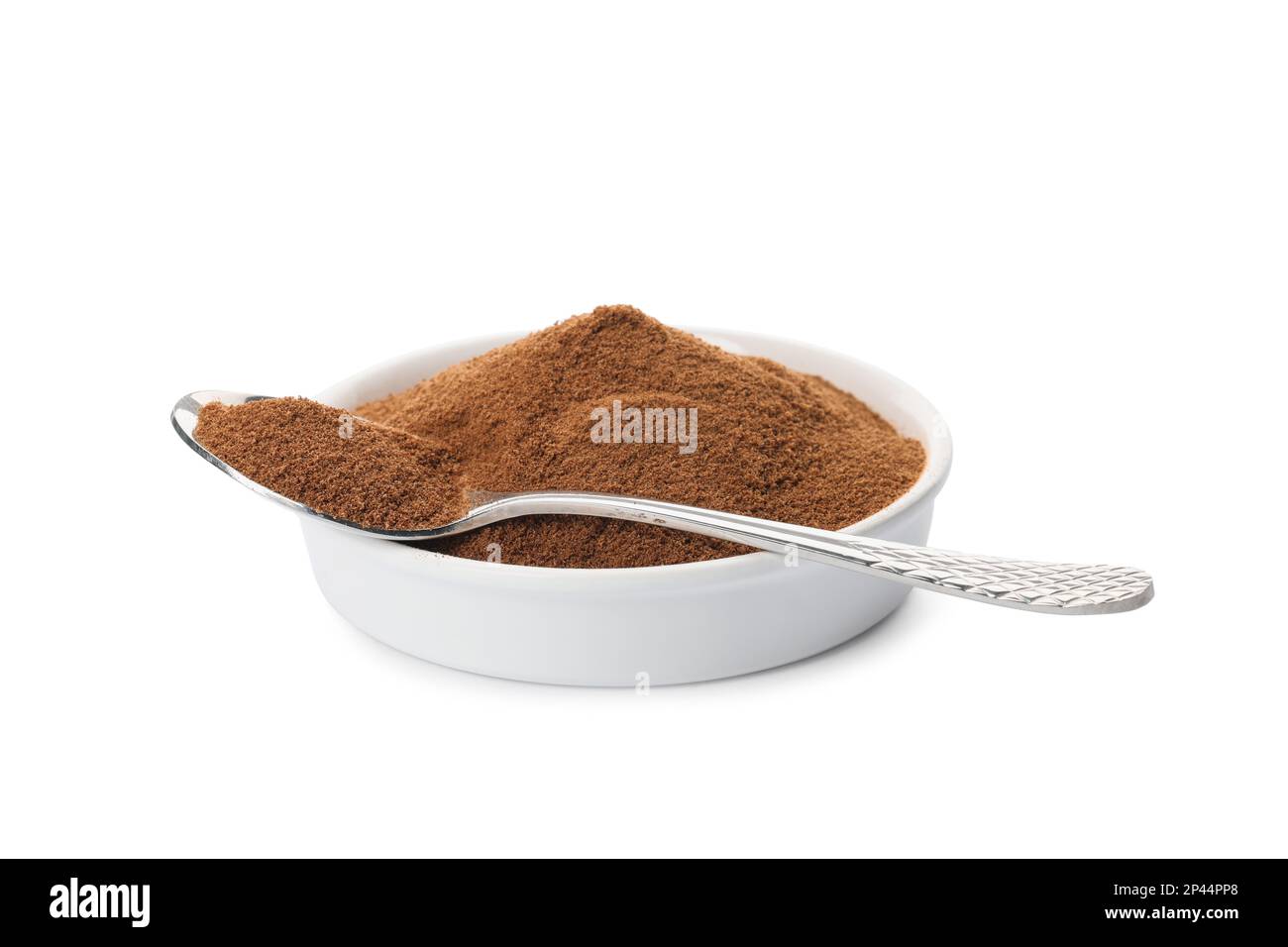 Plate and spoon of chicory powder on white background Stock Photo - Alamy