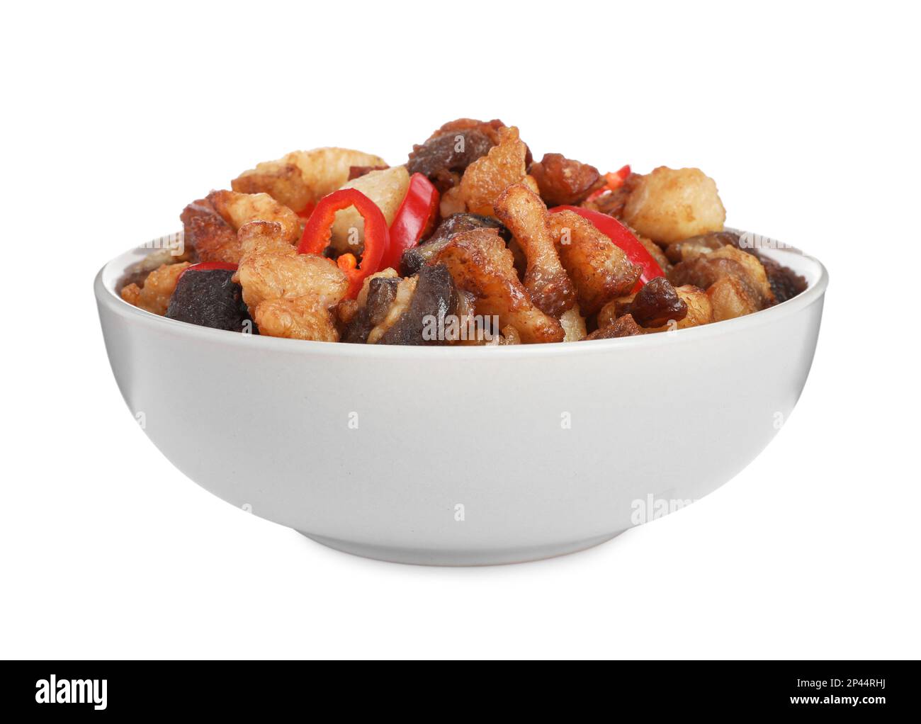 Tasty fried cracklings with chili pepper in bowl on white background ...