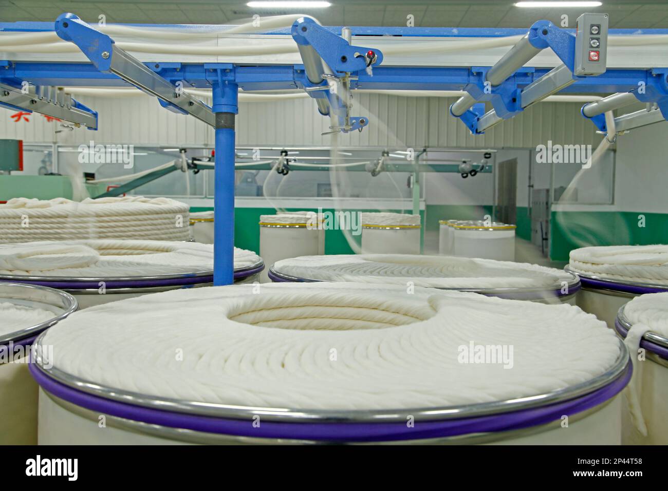 Cotton group in spinning production line factory Stock Photo - Alamy