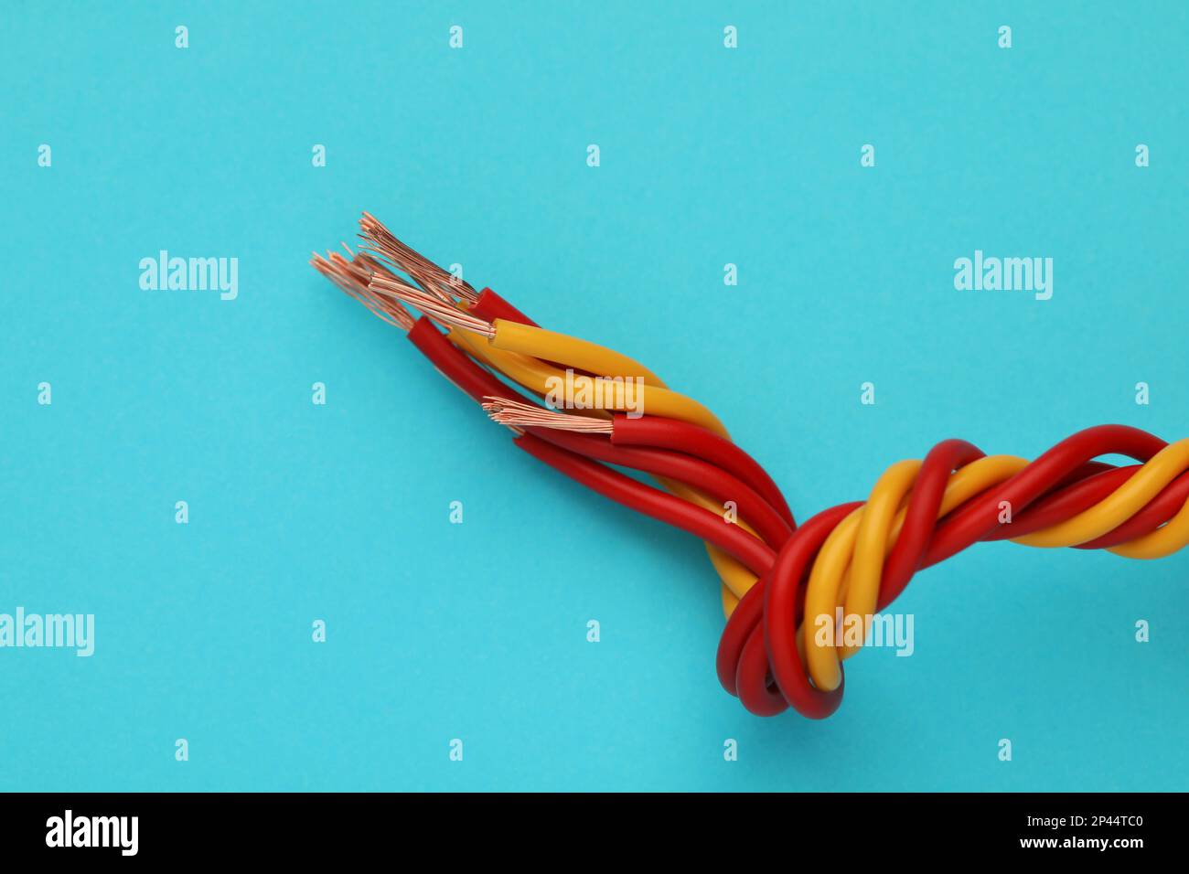 Electrical wires on light blue background, closeup Stock Photo - Alamy