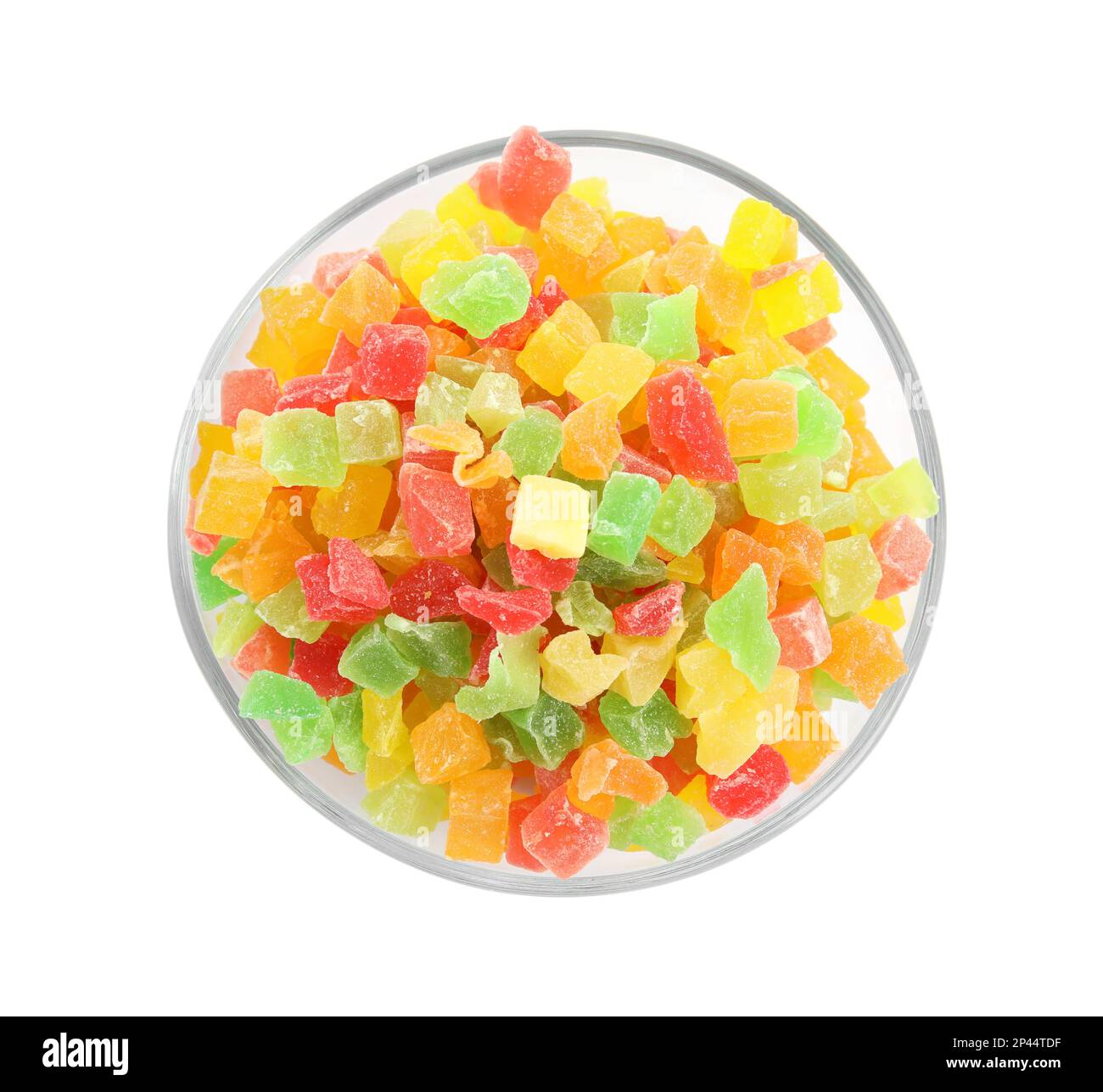 Mix of delicious candied fruits in bowl isolated on white, top view ...