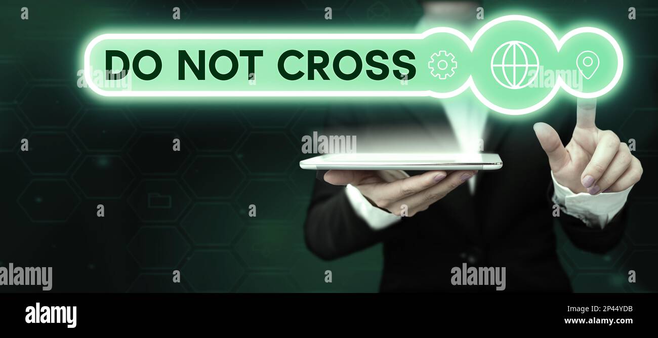 Hand writing sign Do Not Cross. Business approach Crossing is forbidden ...