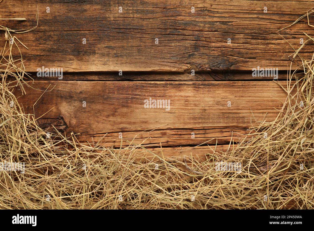 Dried hay on wooden background, flat lay. Space for text Stock Photo ...