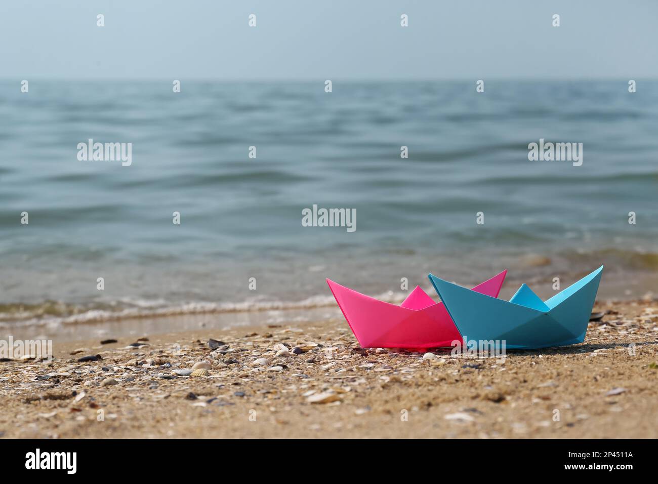 Handmade pink paper boats hi-res stock photography and images - Alamy
