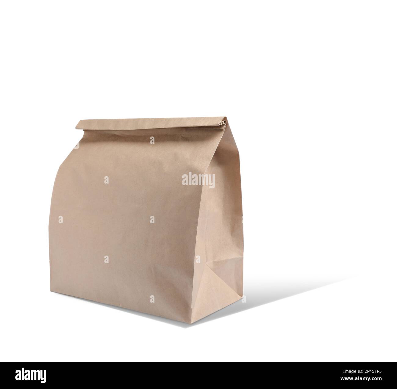 New closed paper bag on white background Stock Photo - Alamy