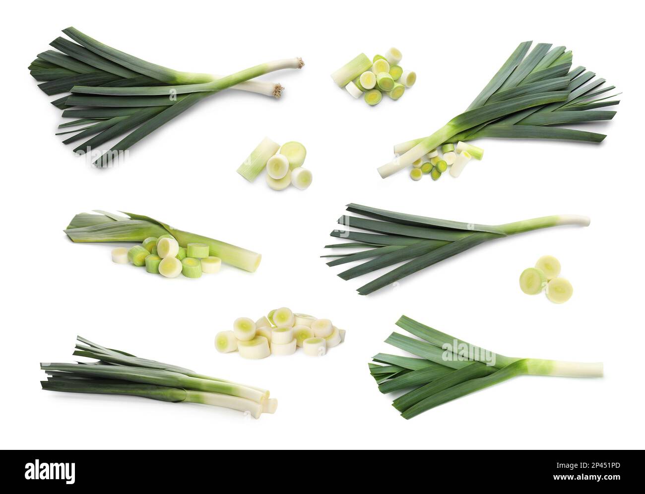 Set with fresh raw leeks on white background Stock Photo - Alamy