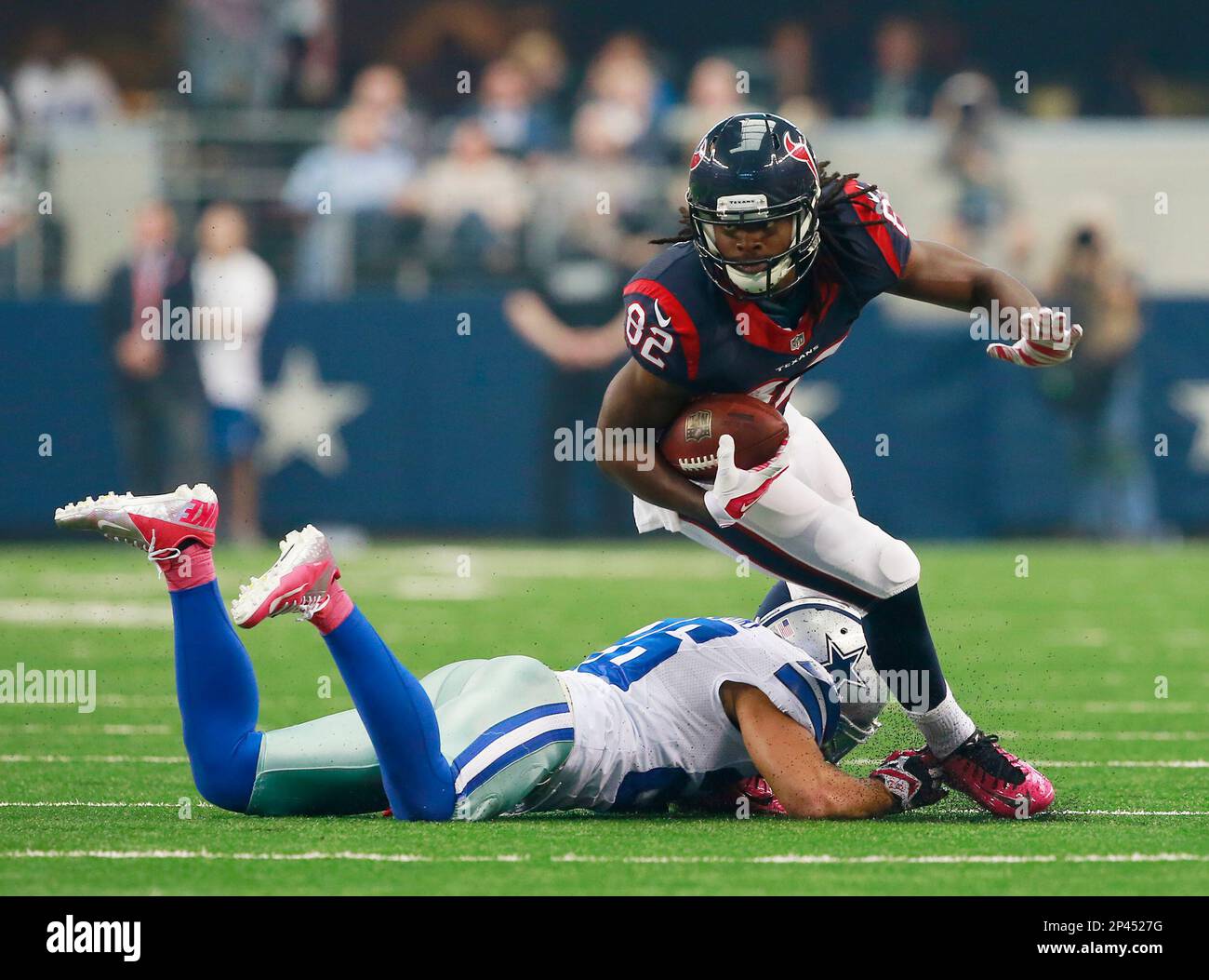 Houston Texans wide receiver Keshawn Martin (82) is tacklde by Dallas ...