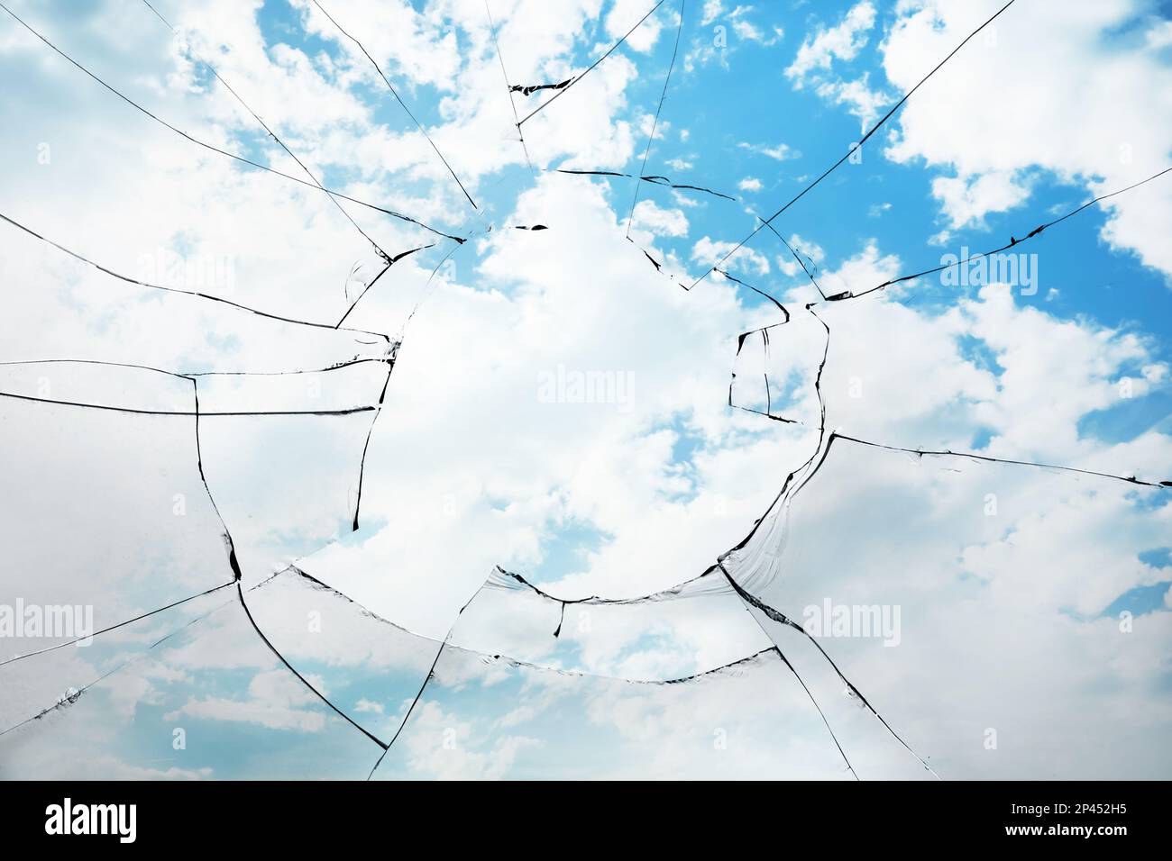 View through broken window on cloudy sky Stock Photo - Alamy