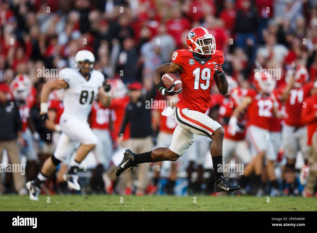 Georgia Bulldogs cornerback Devin Bowman (19) returns an interception ...