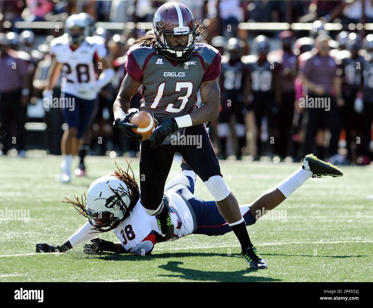 North Carolina Central's Delqwan Jackson (13) runs the ball past Howard ...