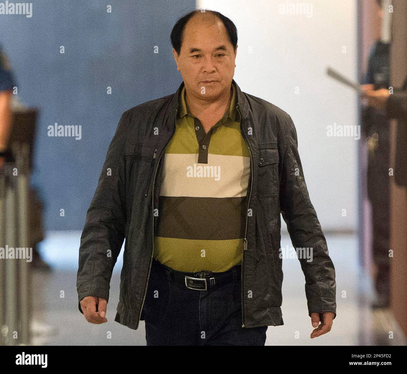 Diran Lin, father of victim Jun Lin, walks to the courtroom for the ...