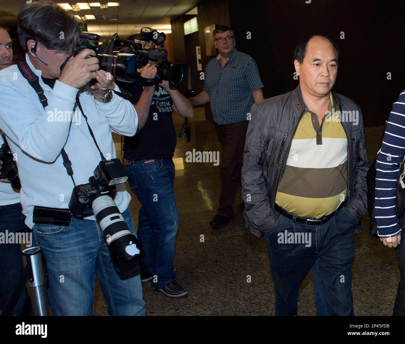 Diran Lin, father of victim Jun Lin, walks to the courtroom for the murder trial of Luka Rocco ...