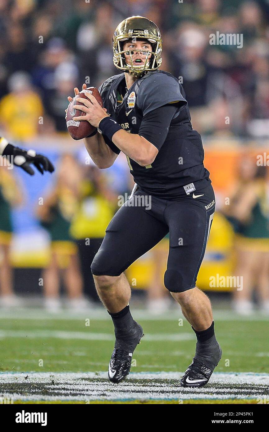 Baylor quarterback Bryce Petty (14) looks to throw during Tostitos ...