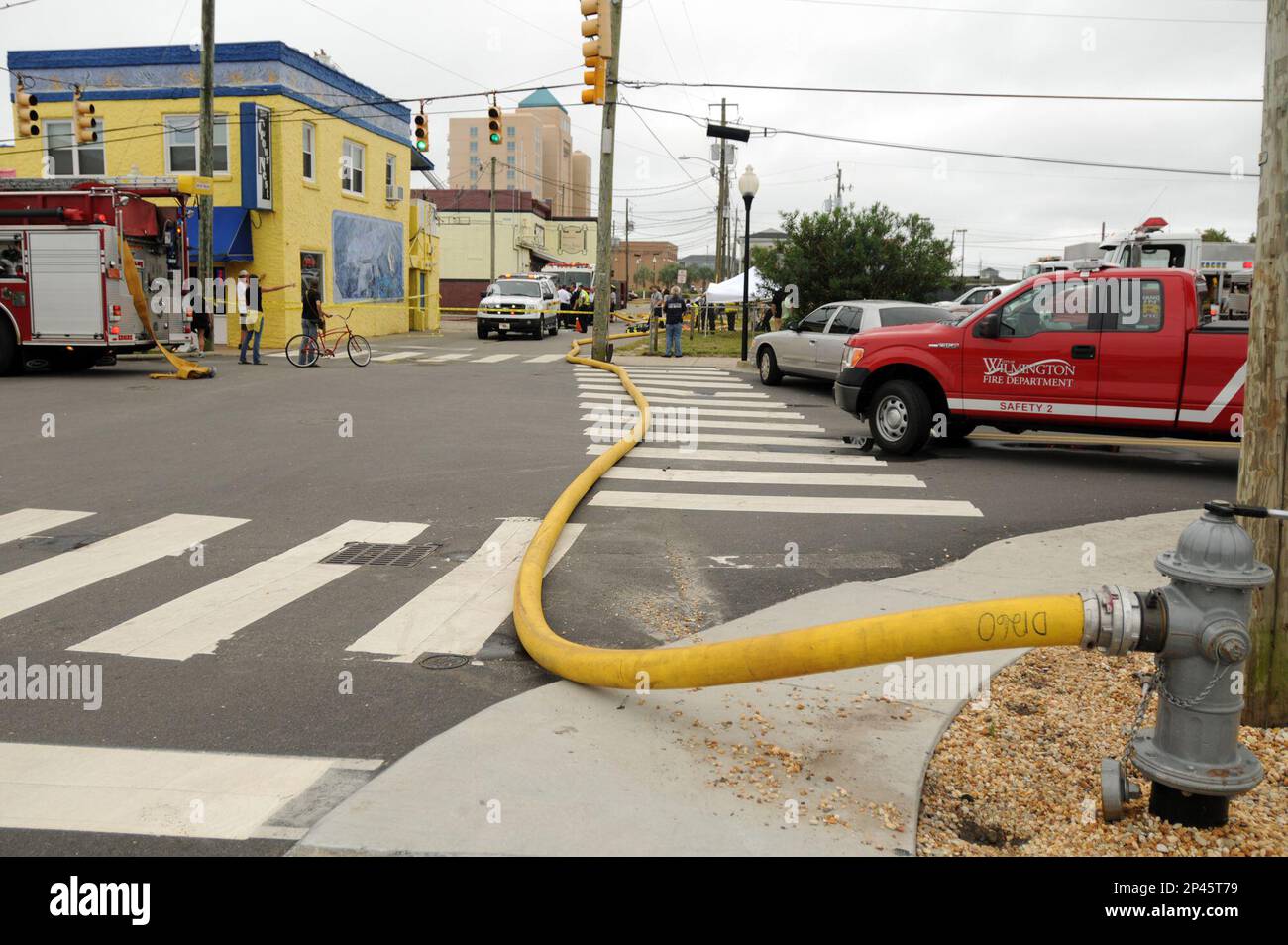 Fire crews work to control a fire at the Carolina Beach Boardwalk in ...