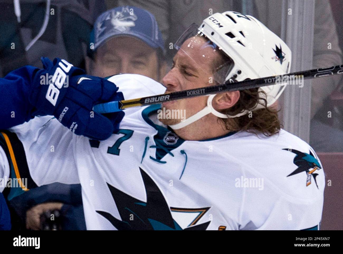 San Jose Sharks defenseman Taylor Doherty gets a stick to the side of ...