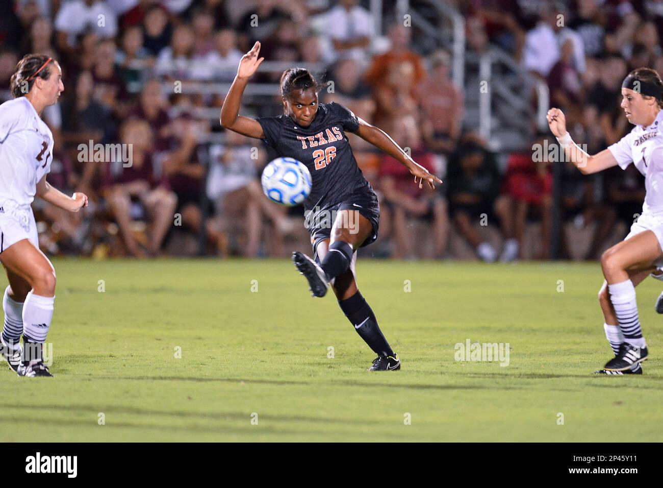 Texas forward Jasmine Hart (26) kicks the ball during an NCAA soccer ...