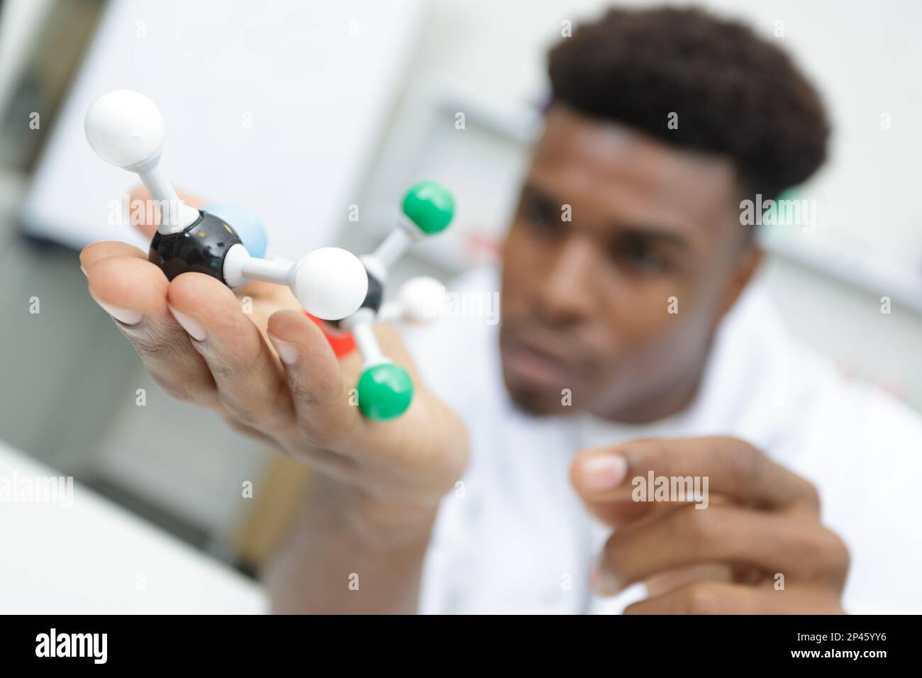 scientist holding plastic model molecule Stock Photo - Alamy