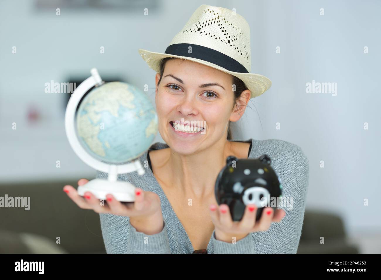 Attractive young lady holding cash hi-res stock photography and images ...