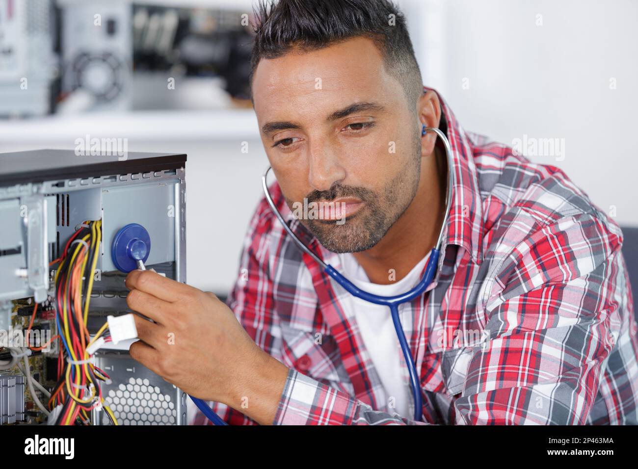 man taking care of a broken pc Stock Photo - Alamy