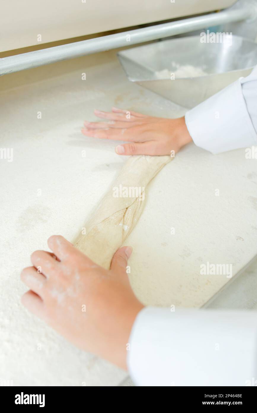 Female baker rolls dough hi-res stock photography and images - Alamy