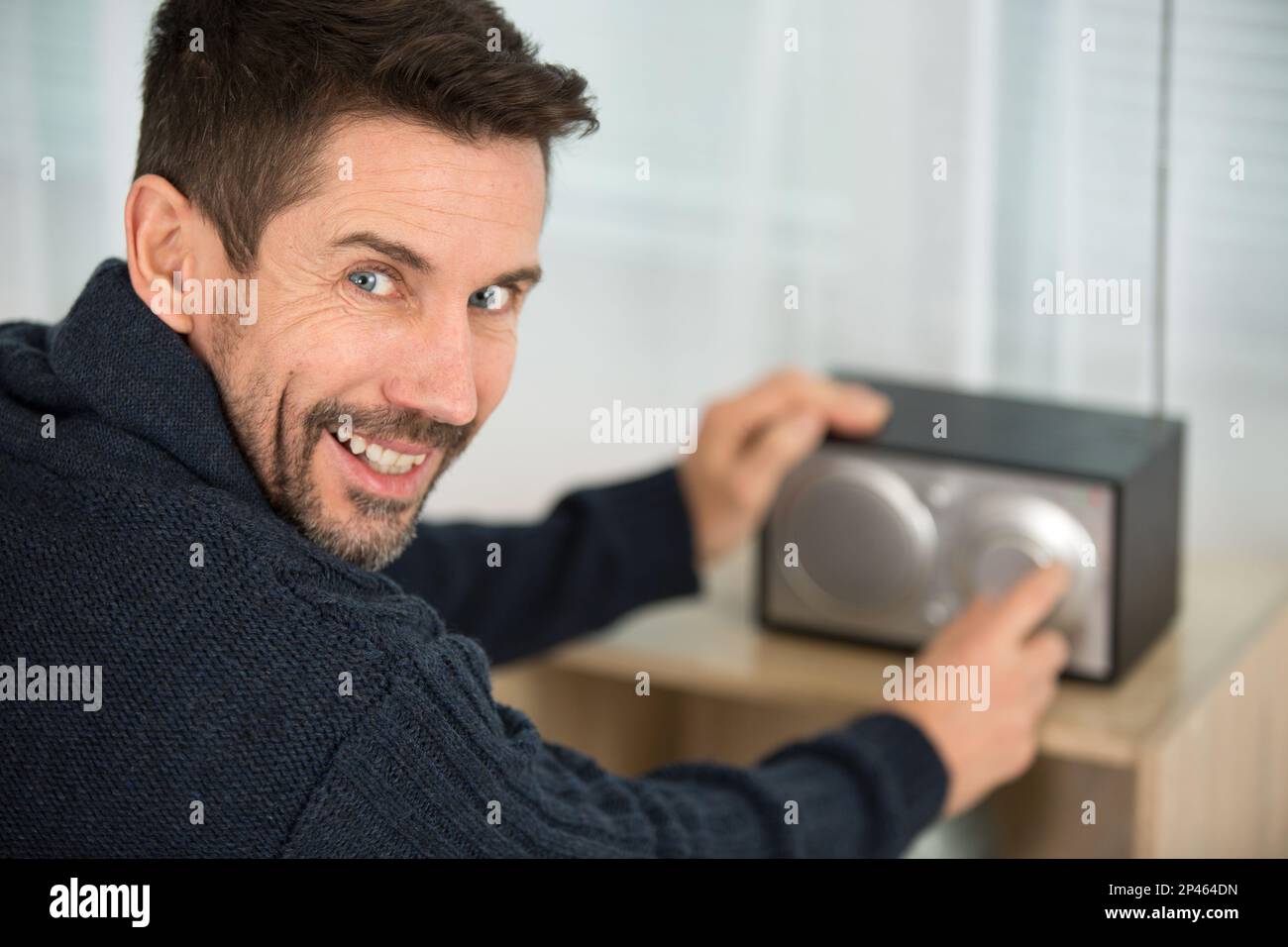 happy man with a new radio at home Stock Photo - Alamy