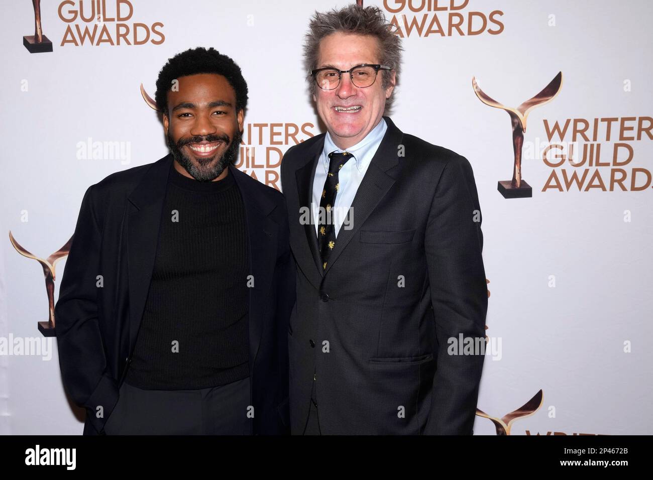 Donald Glover, left, and Paul Simms attend the 75th annual Writers ...