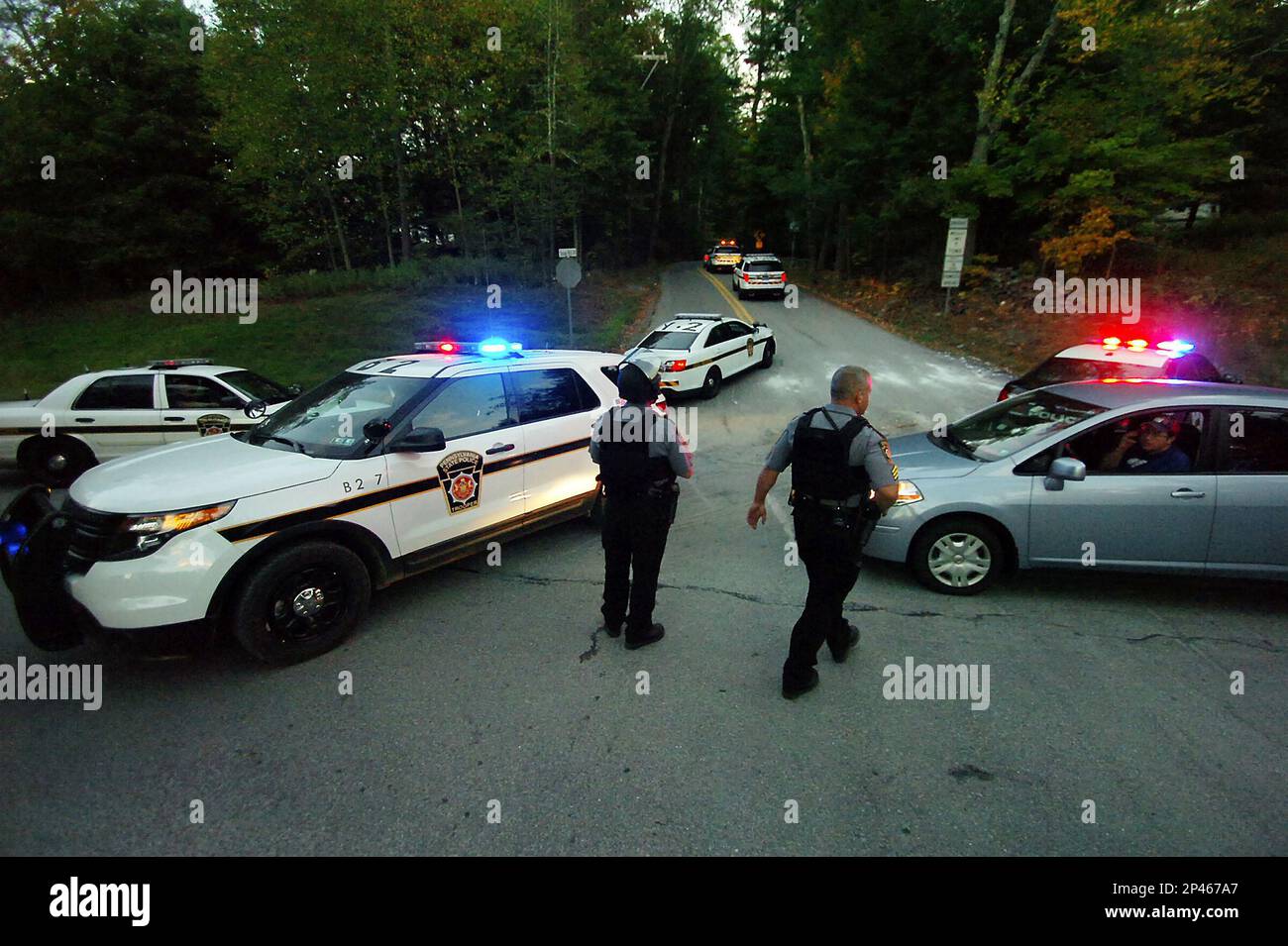 Police State Police vehicles speed up Snow Hill Road on Route 447 in ...