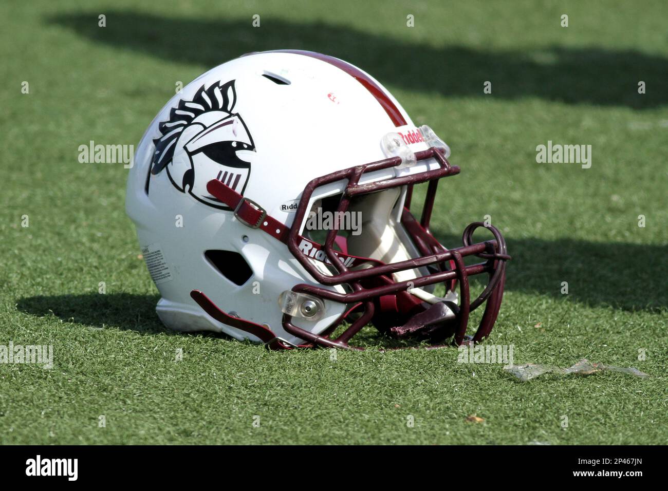 A Curtis Warriors helmet lies on the turf during a high school football ...
