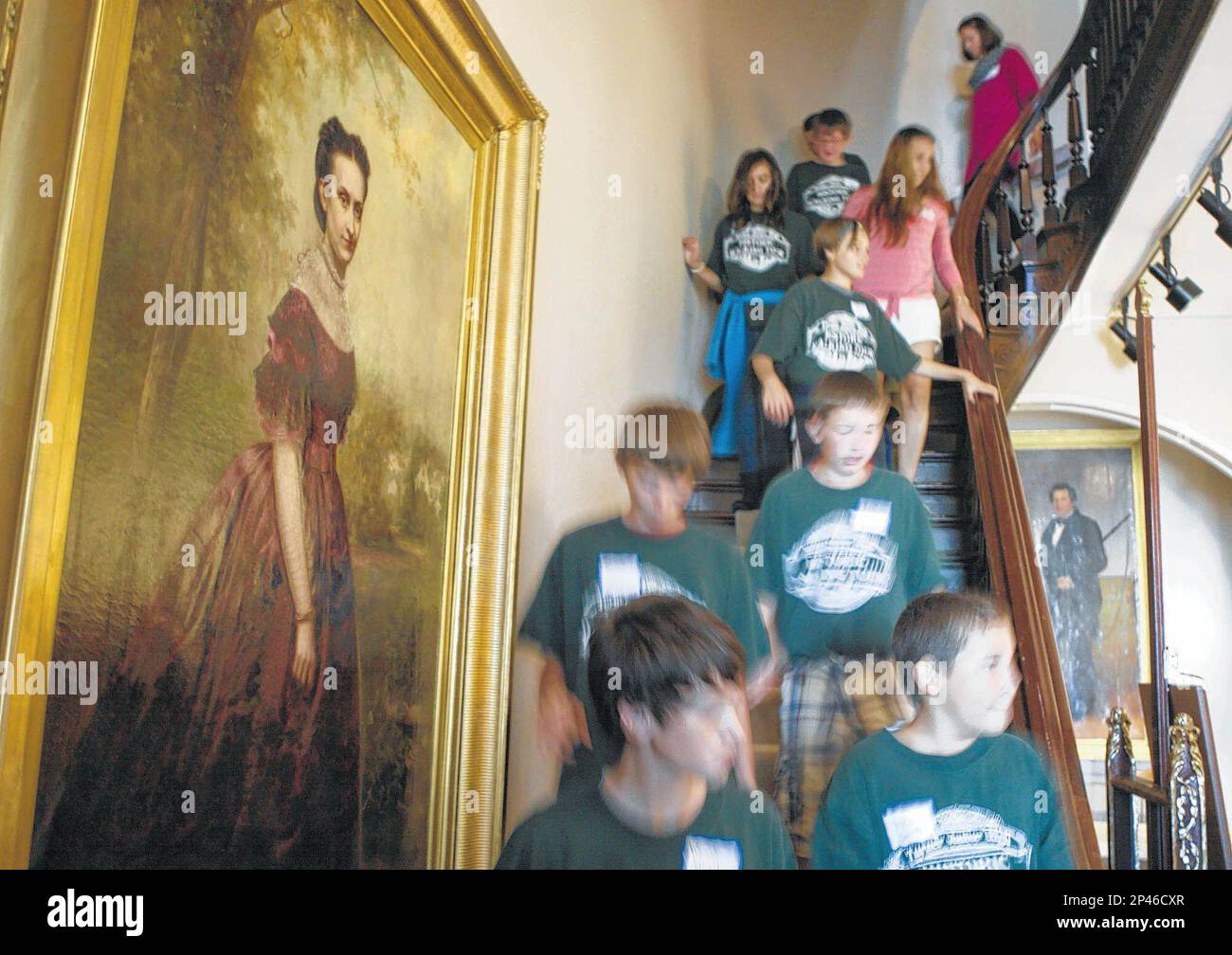 Turner Junior High School students file down stairs inside the David ...