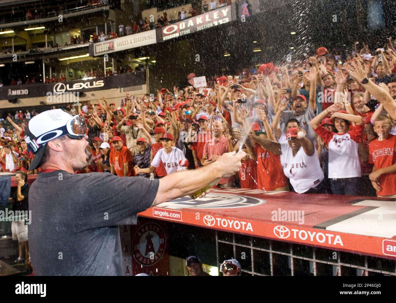 The Angels' David Freese sprays the crowd with champagne after the ...