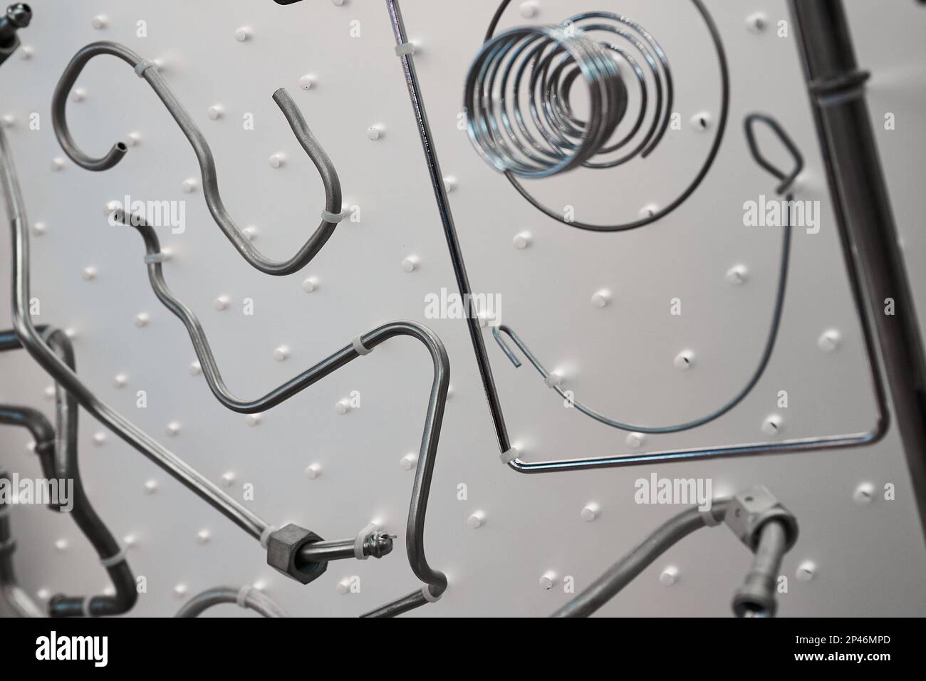 Shiny steel pipes on display in contemporary hardware store Stock Photo ...