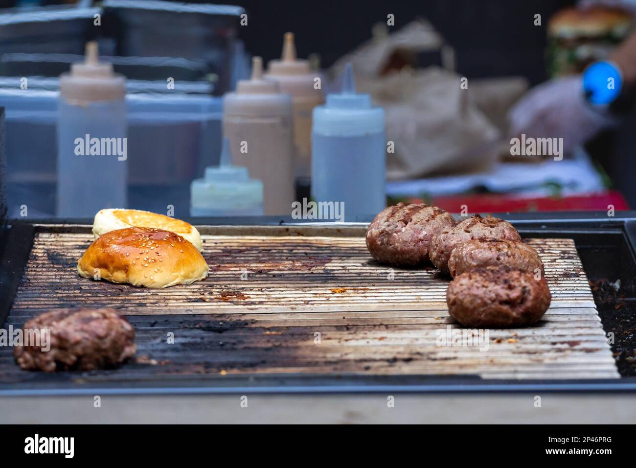 Picture of a bunch of hamburgers,, ready to get grilled served and be ...